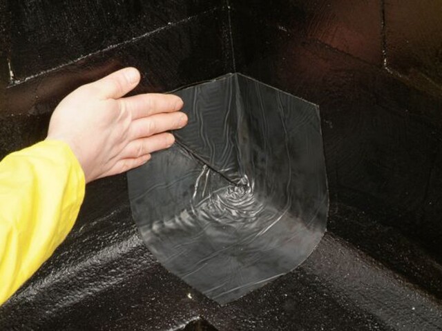 Basement waterproofing with cold-applied and self-bonding bitumen ...